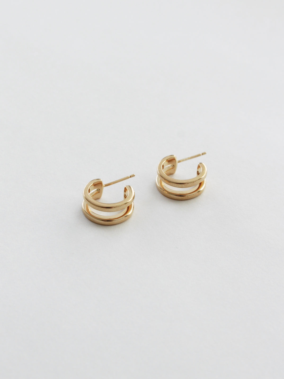 Saturn earrings in gold – CALLMOON